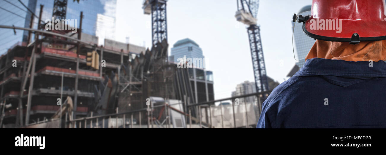 Composite image of back of firefighter Stock Photo - Alamy