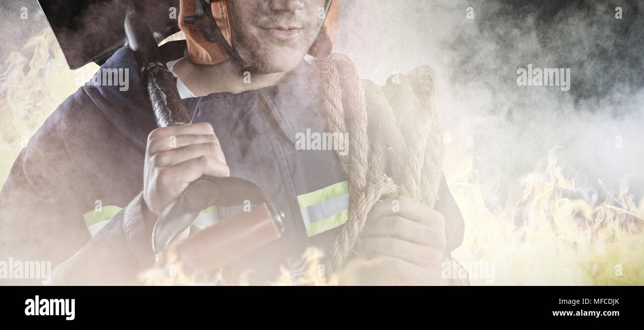 Composite image of professional fireman Stock Photo - Alamy
