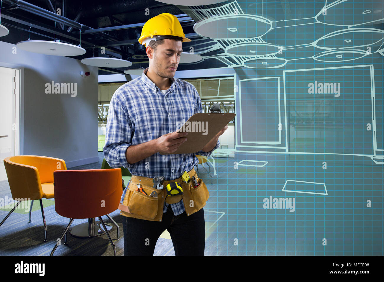 Composite image of concentrated construction worker Stock Photo - Alamy