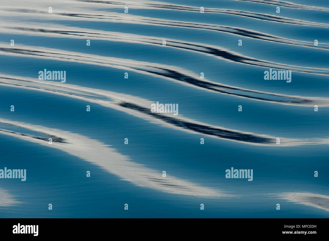 Ripples in wake of ship Stock Photo - Alamy
