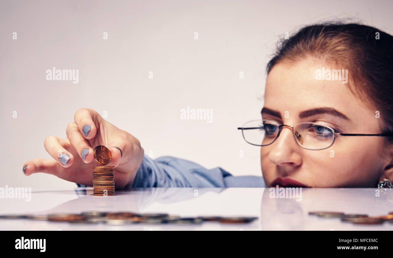 Woman counting money economy hi-res stock photography and images - Alamy