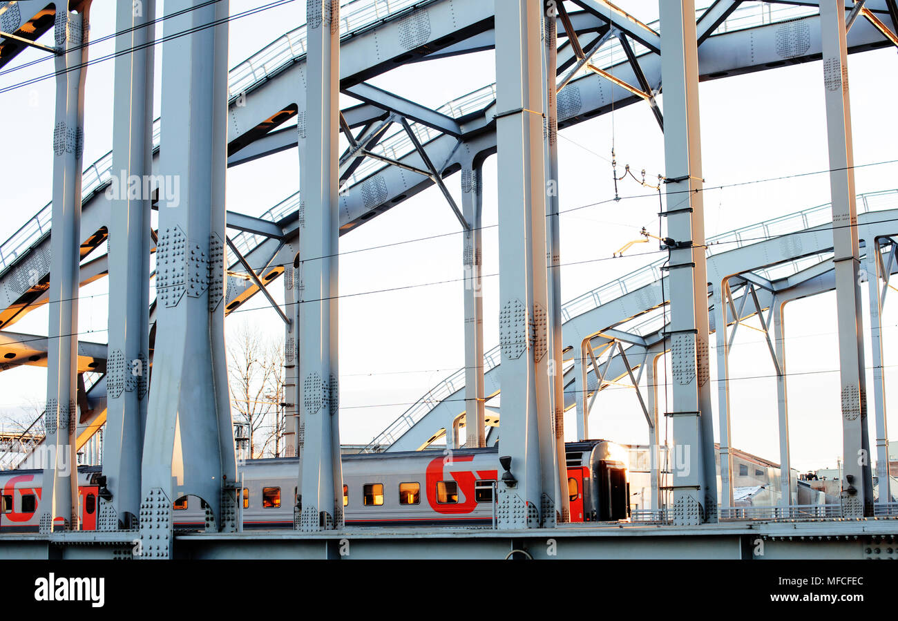 landscape with railway with trains, lot of steel rafters at suns Stock ...