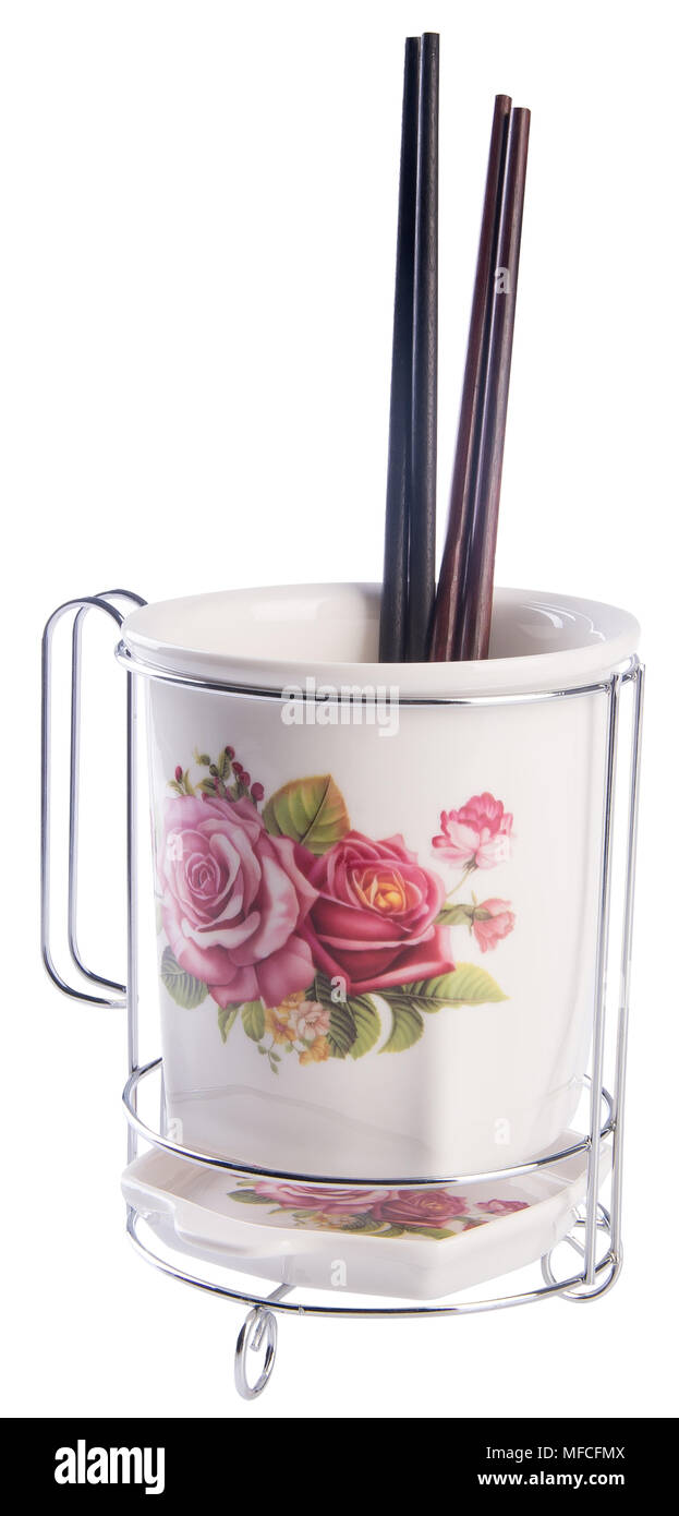 Kitchen utensils holder on the background Stock Photo - Alamy