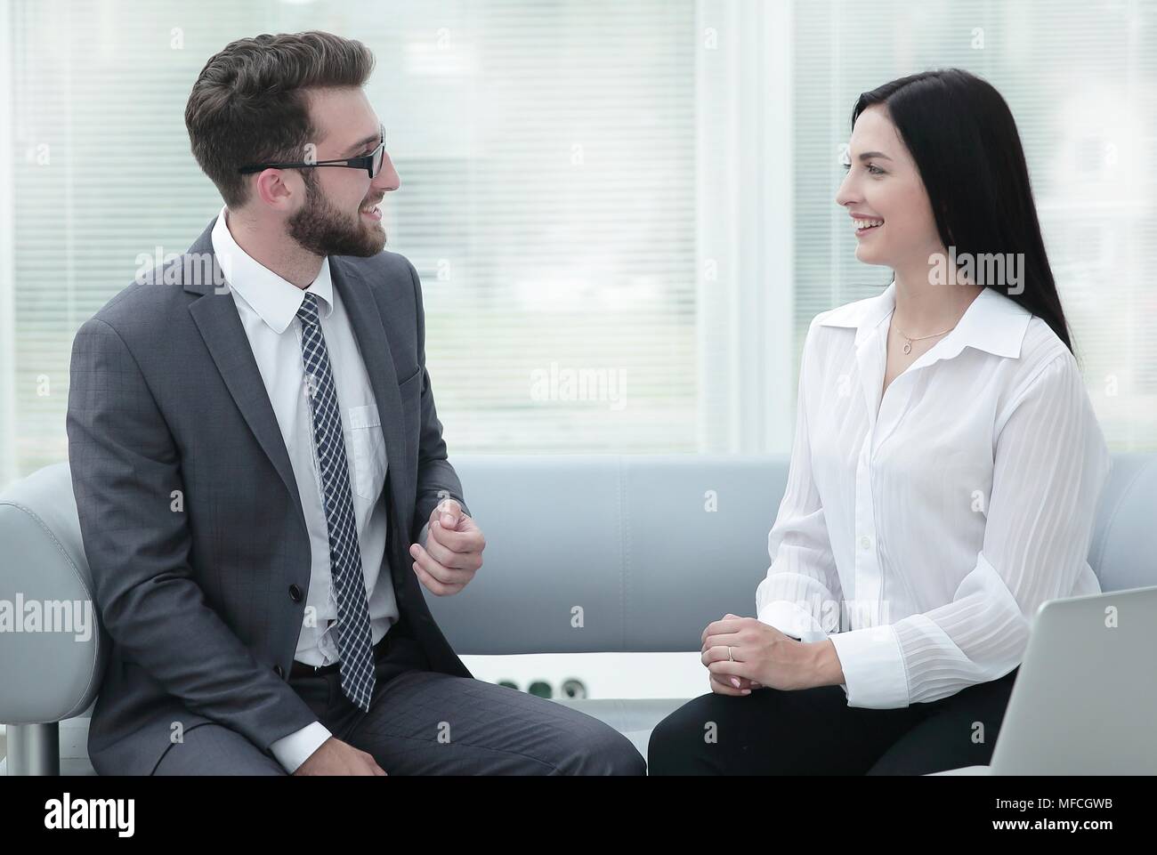 manager and customer talking in a modern office Stock Photo - Alamy