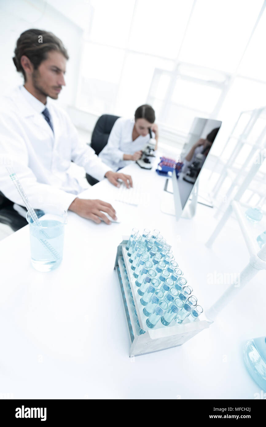 side view of scientists working in laboratory Stock Photo - Alamy