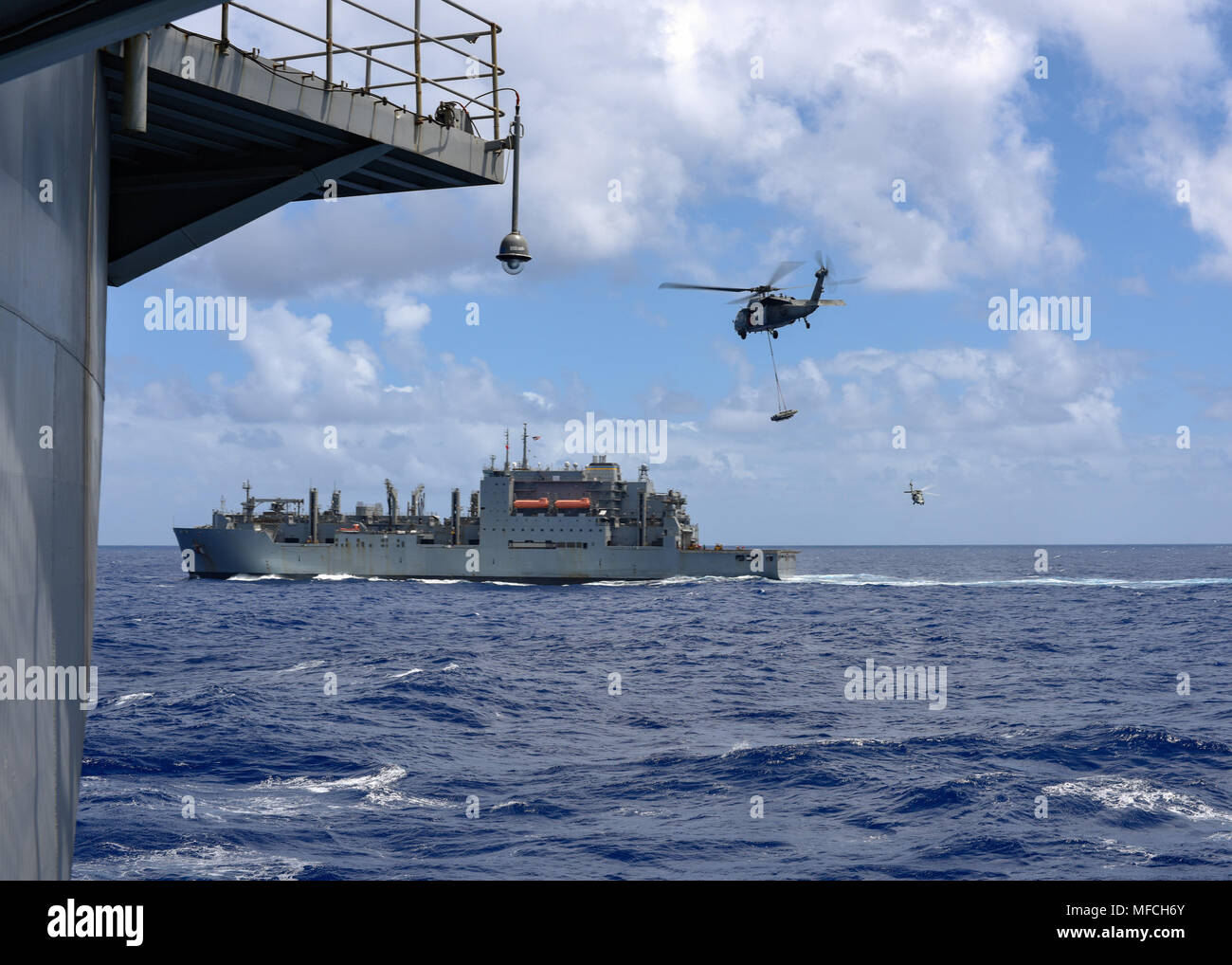 180424-N-NG033-1046 PACIFIC OCEAN (April 24, 2018) Two MH-60S Sea Hawks ...