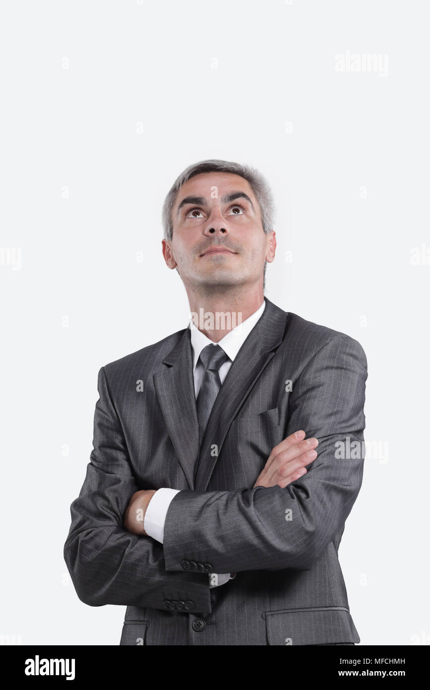 serious businessman looking up Stock Photo - Alamy