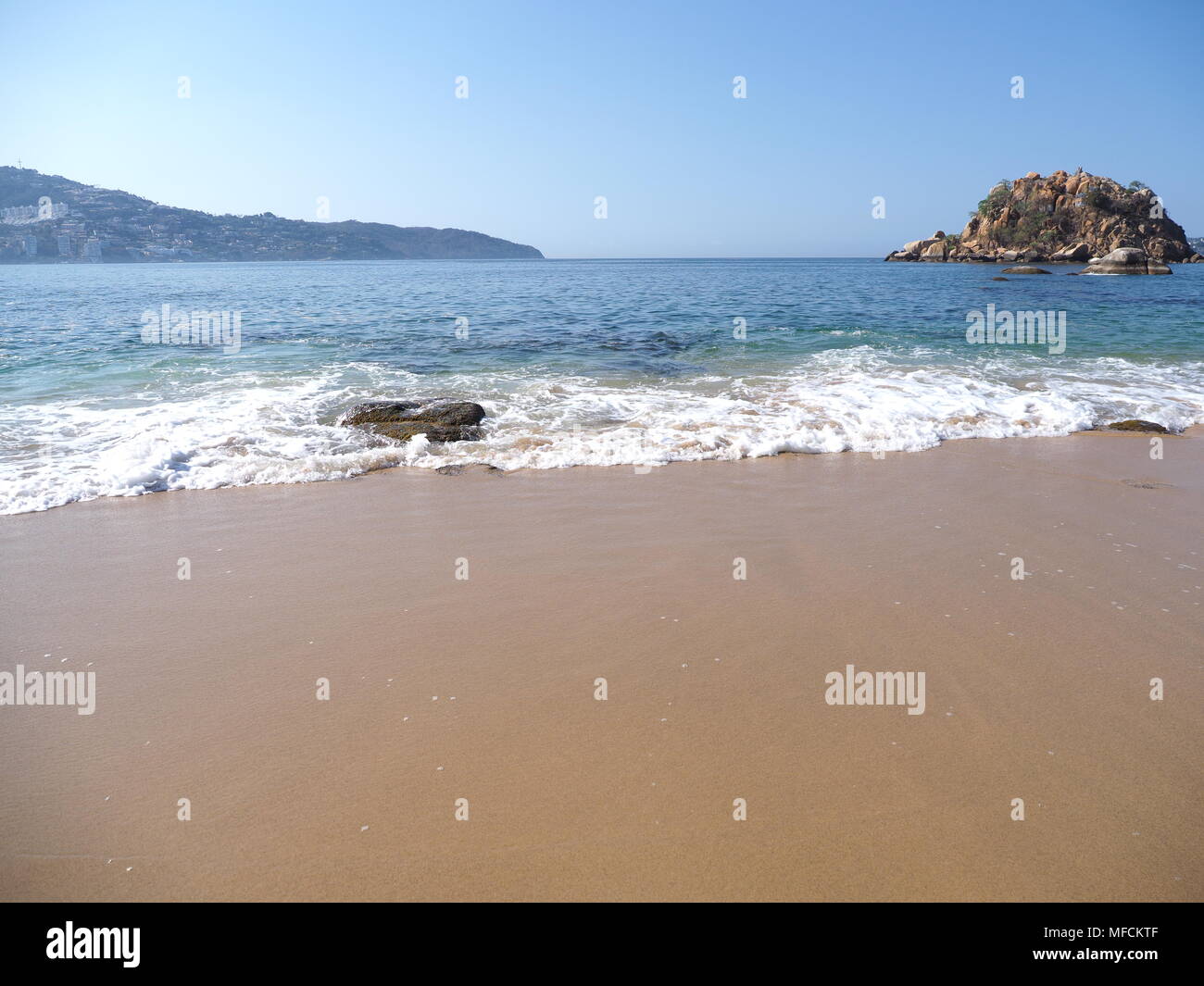 Scenery of rocks at bay of ACAPULCO city in Mexico, Pacific Ocean waves ...