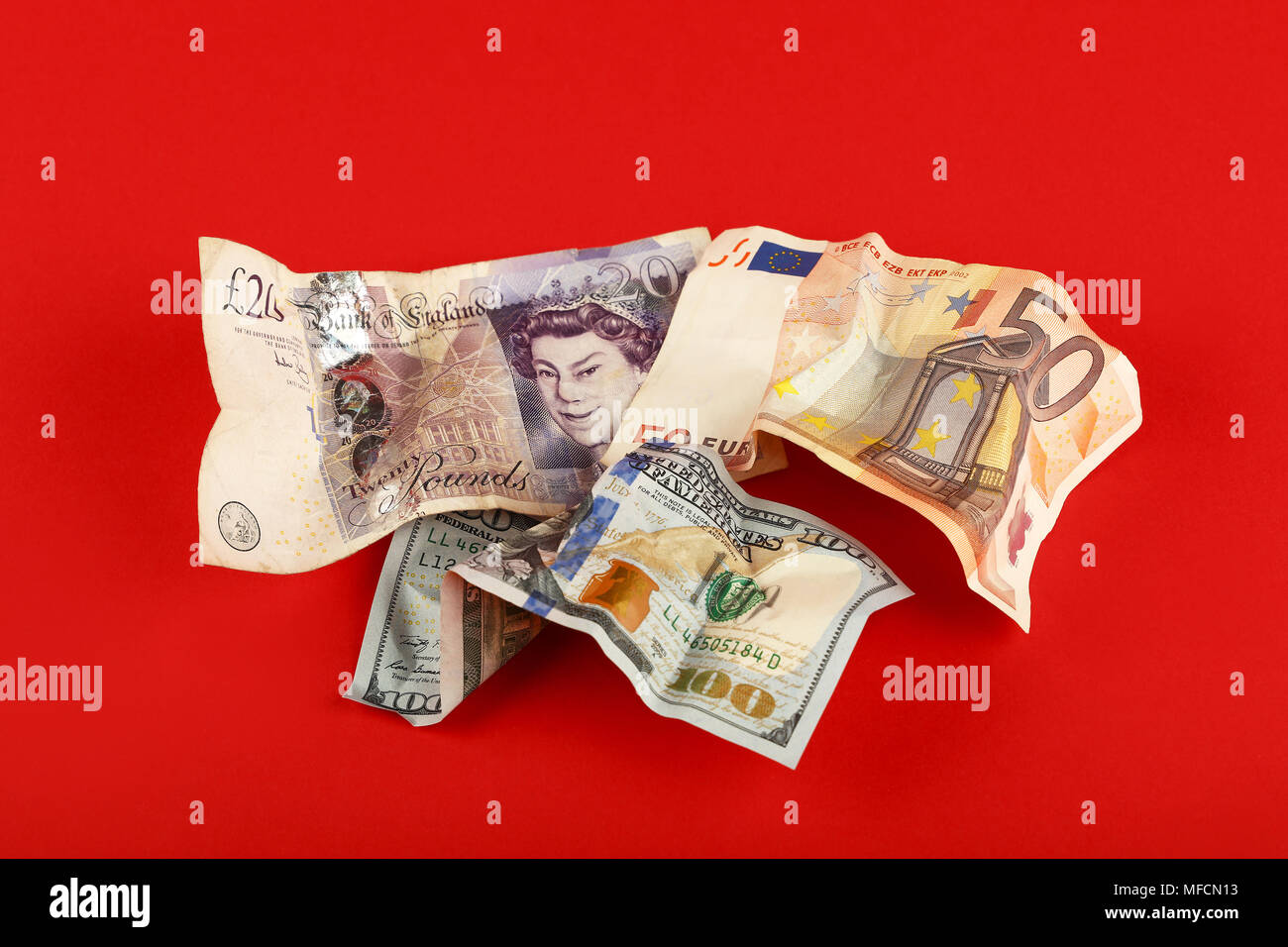 Close up crumpled paper currency banknotes of US dollar, Euro and ...