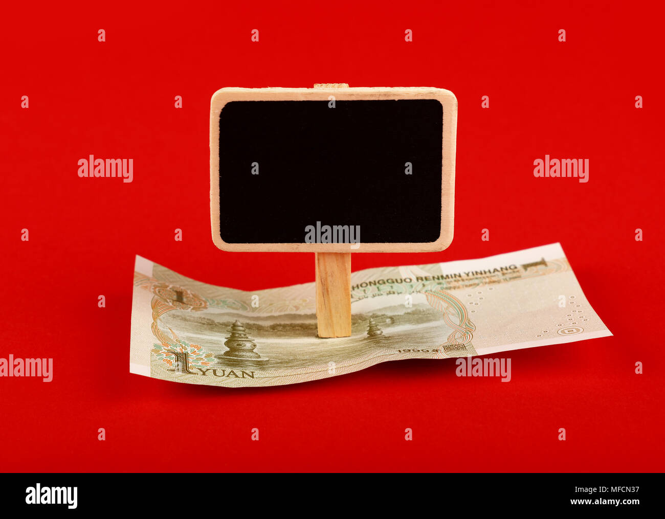 Close up one Chinese Yuan paper currency banknote and blank chalk ...