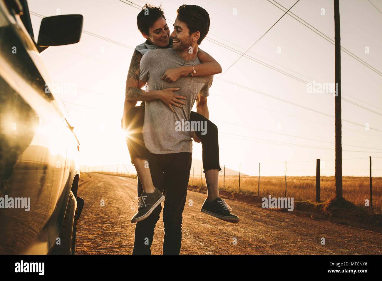 Piggy Back Ride Woman And Man High Resolution Stock Photography and ...