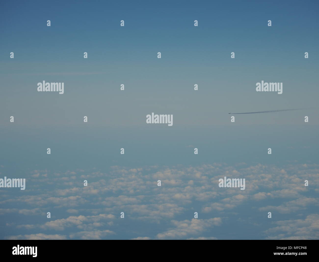 Beautiful aerial panorama of blue sky and cloud as seen through window ...