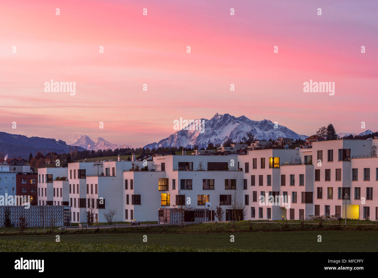 Modern part of Cham city in canton of Zug in front of Pilatus mountain ...