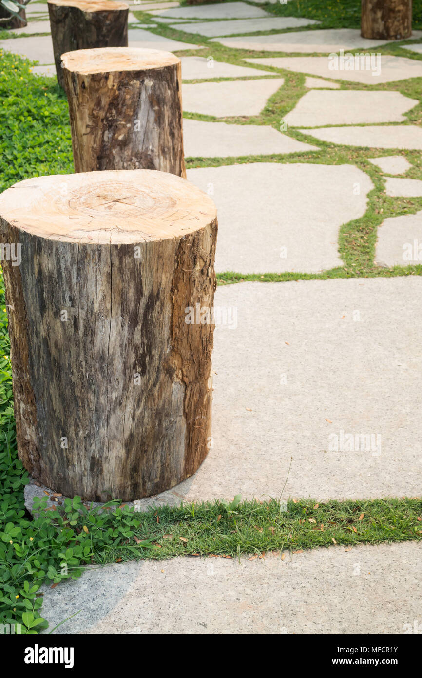 Wooden stool on green garden, stock photo Stock Photo - Alamy
