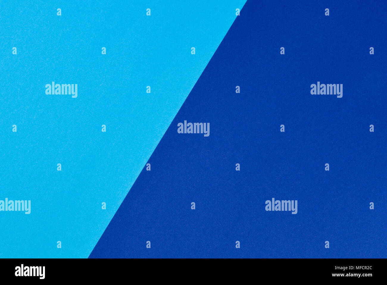 Two tone of blue colored paper background Stock Photo - Alamy