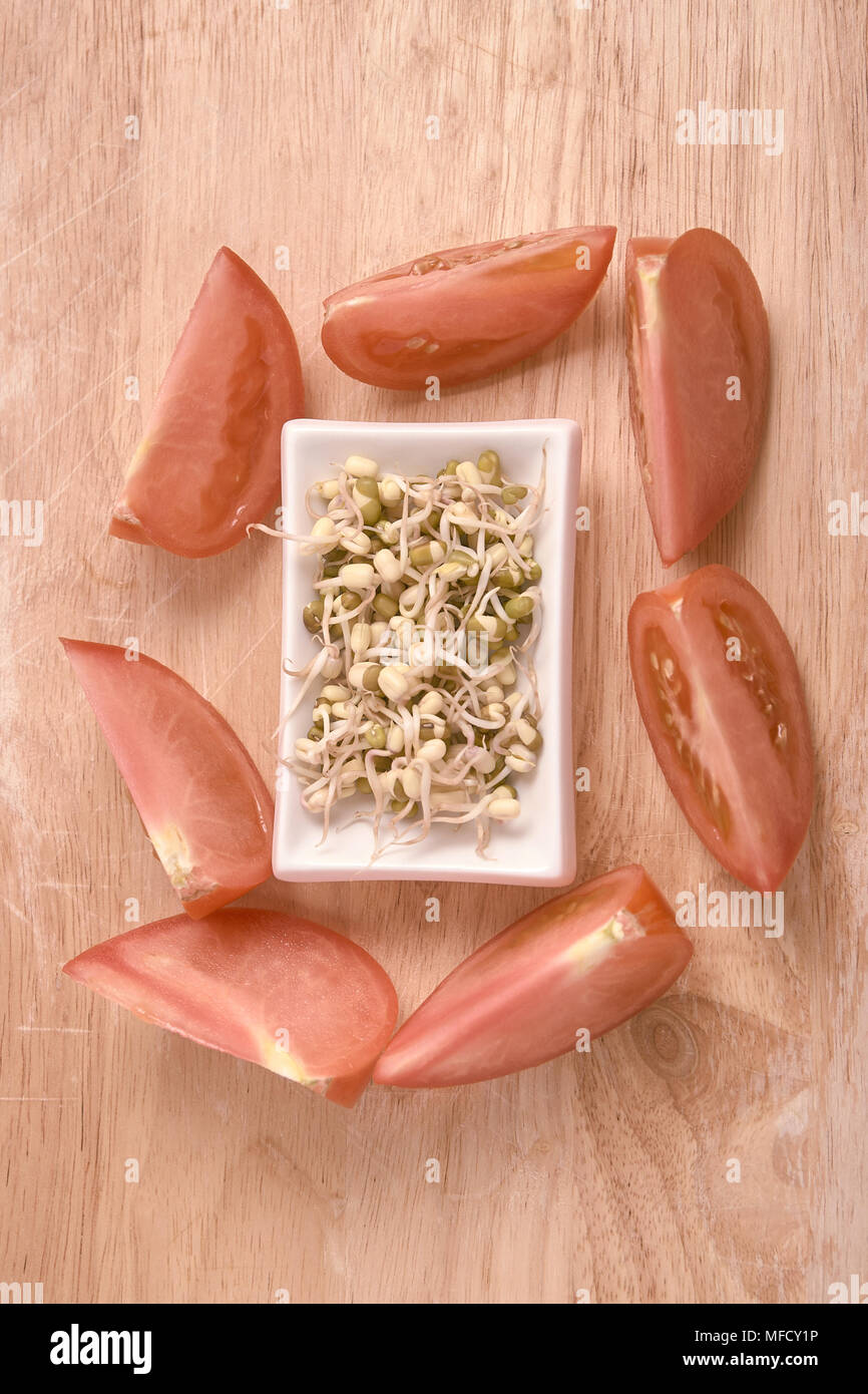 Fresh red tomato. Sprouted beans. Healthy food Stock Photo - Alamy