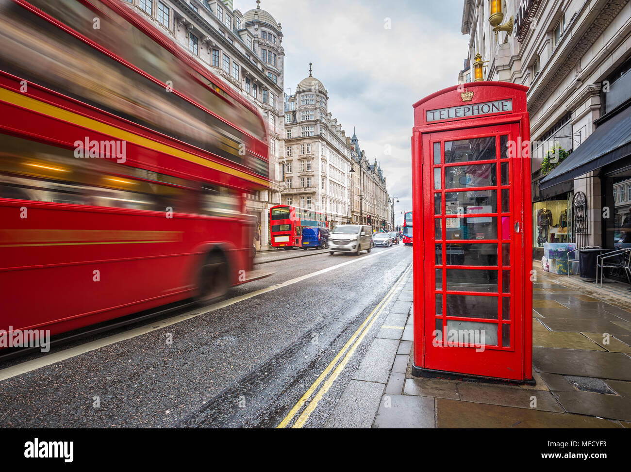 London, England - Iconic blurred vintage red double-decker bus on the ...