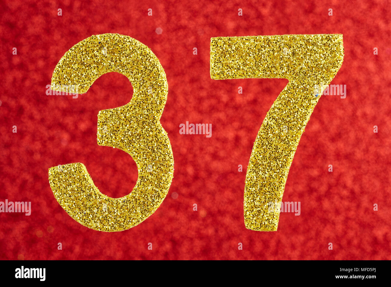 Number thirty-seven yellow color over a red background. Anniversary ...