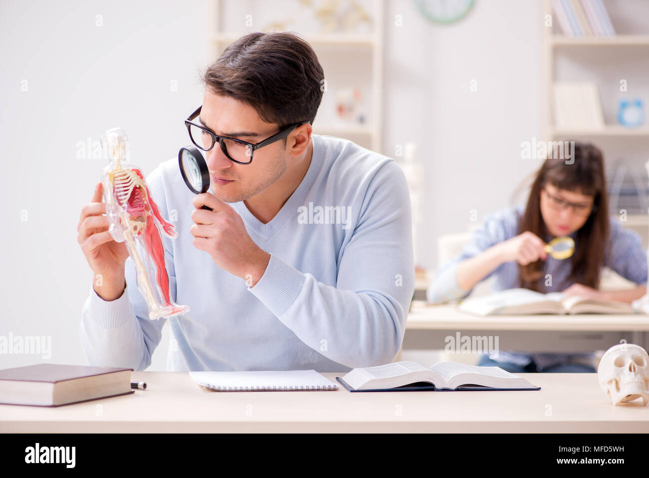 Two medical students studying in classroom Stock Photo - Alamy