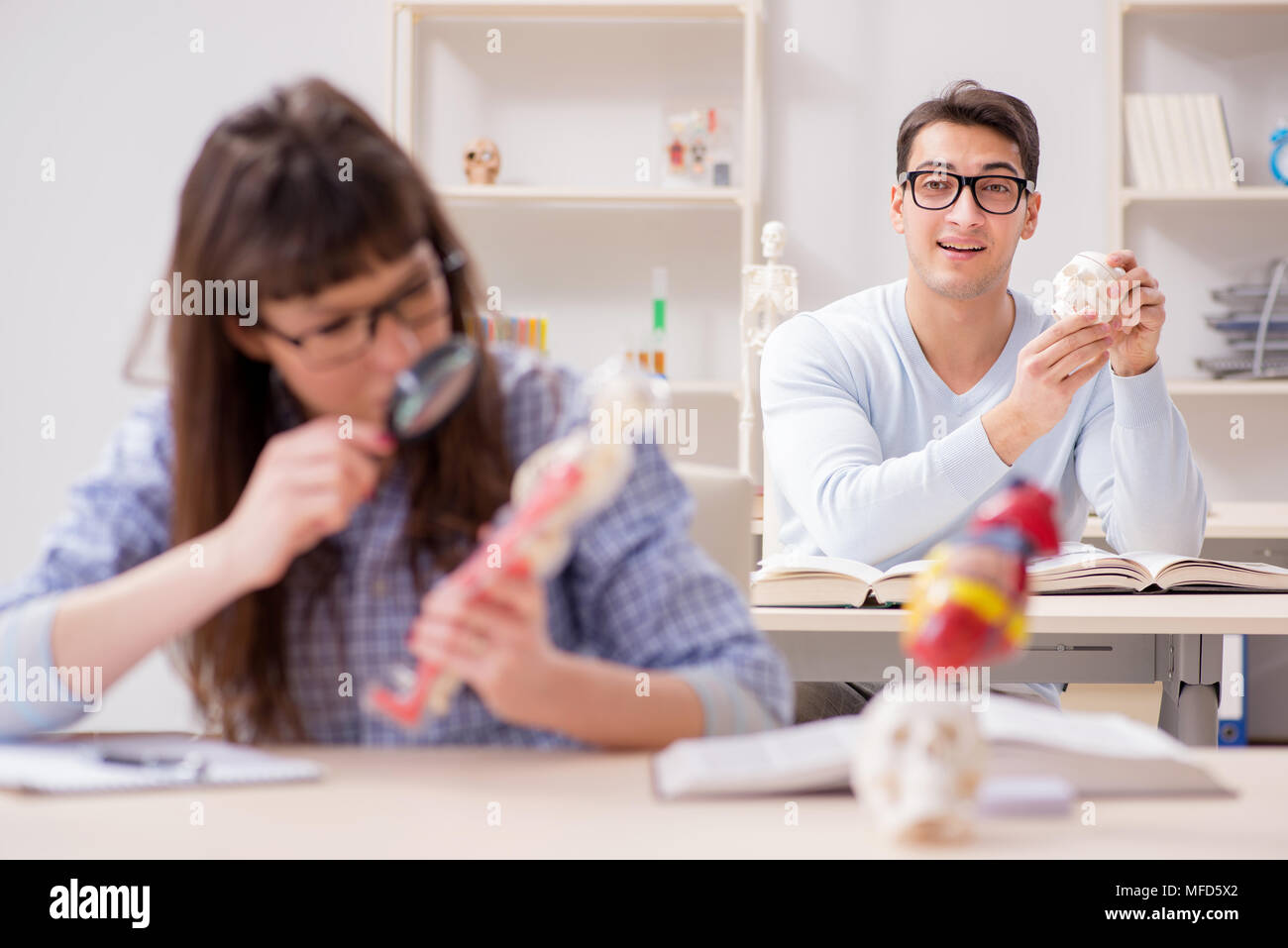 Two medical students studying in classroom Stock Photo - Alamy