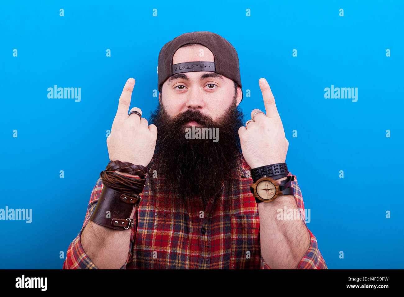 Handsome hipster man pointing finger hi-res stock photography and ...
