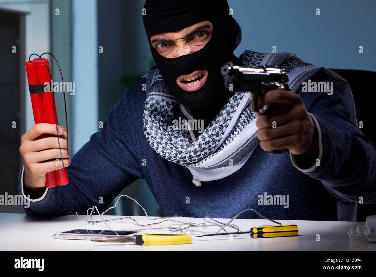 Terrorist bomber preparing dynamite bomb Stock Photo - Alamy