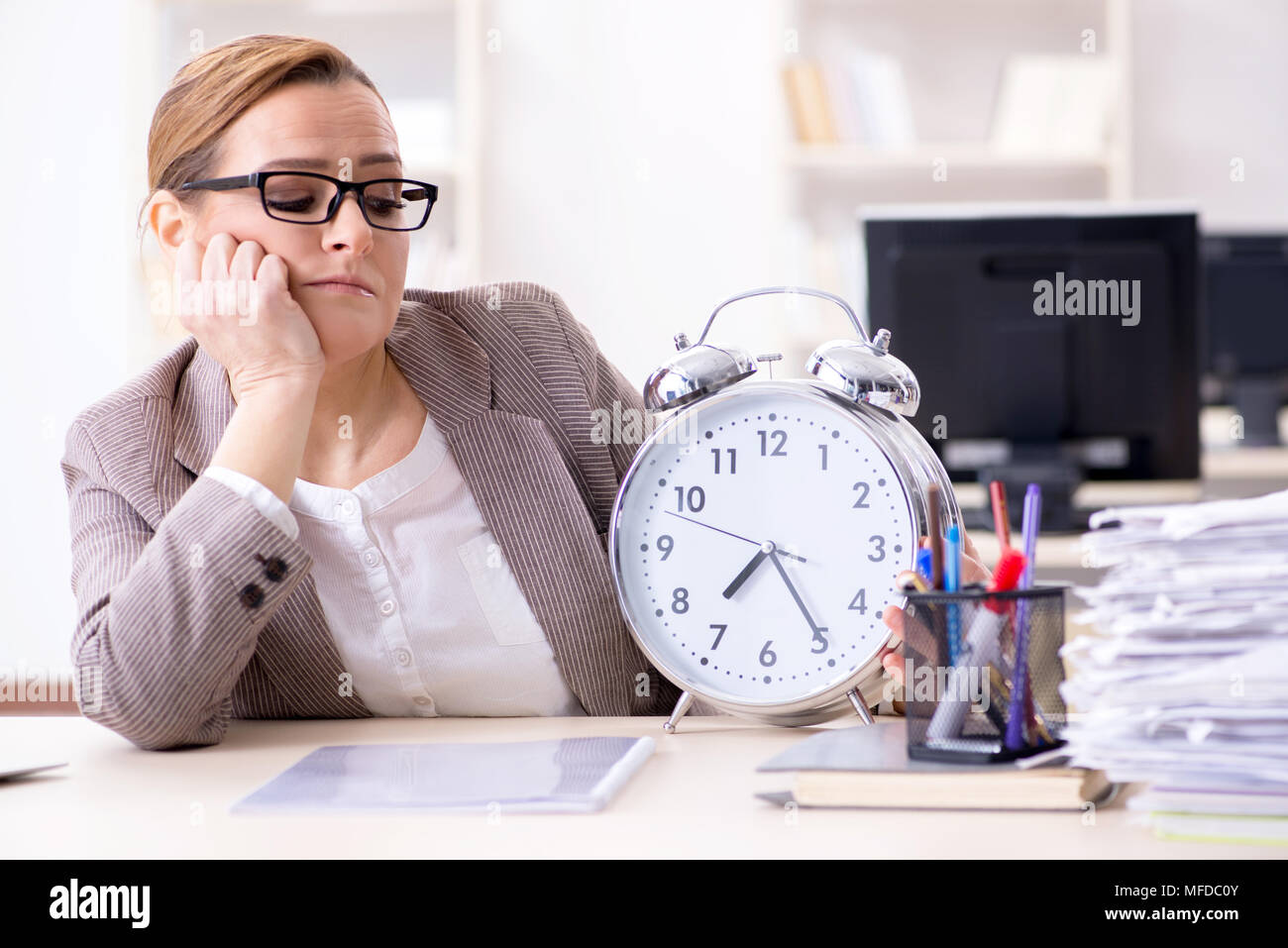 Businesswoman workaholic trying finish hi-res stock photography and ...