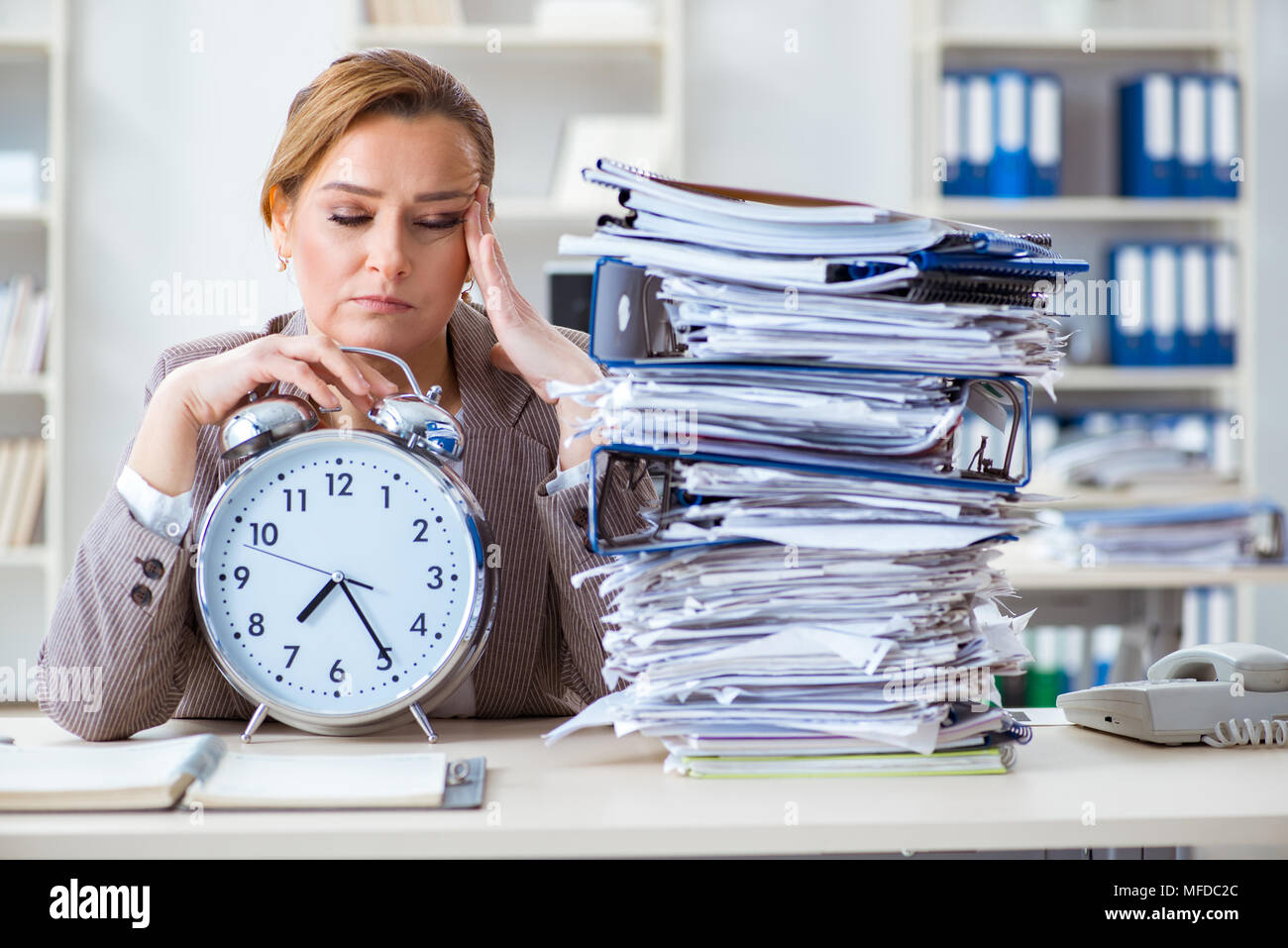 Businesswoman workaholic trying finish hi-res stock photography and ...