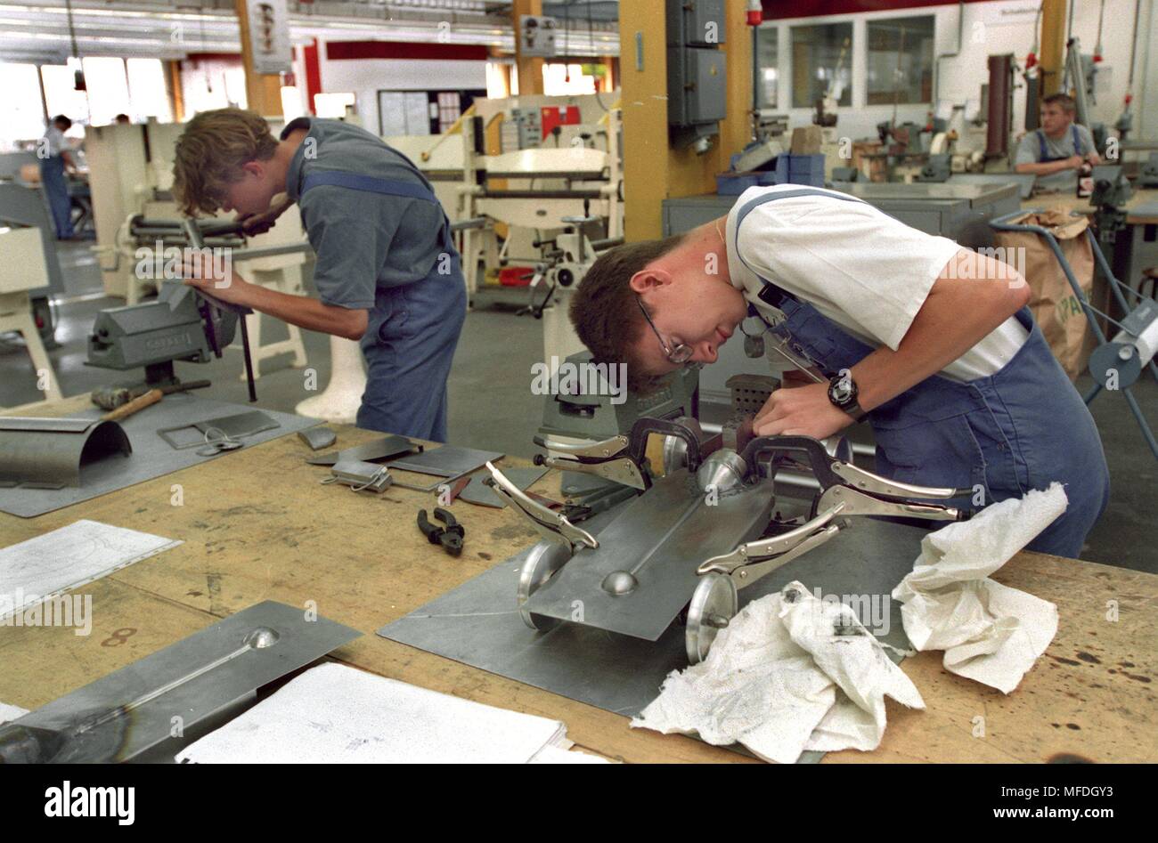 A look into the training workshop at BMW: Two trainees from the ...