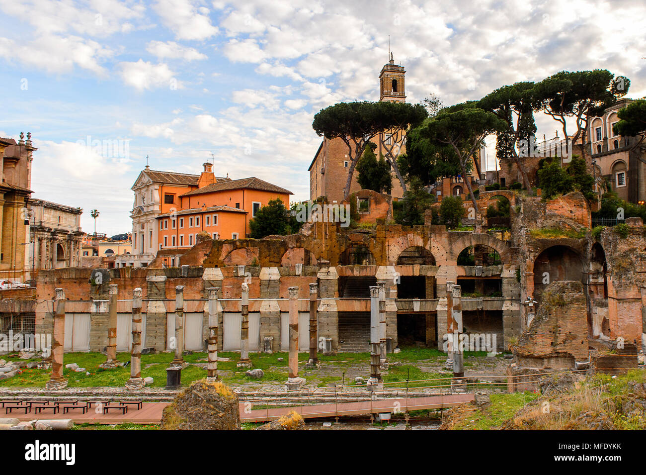Roman Forum in the evening, a rectangular forum surrounded by the ruins ...
