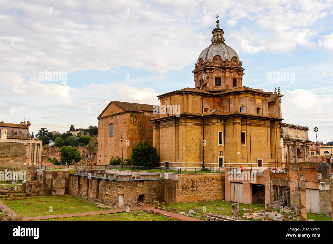 Roman Forum in the evening, a rectangular forum surrounded by the ruins ...