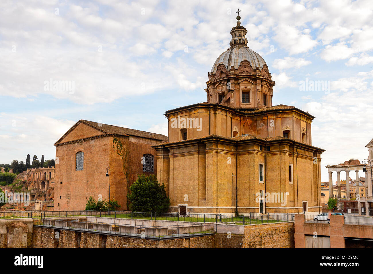Roman Forum in the evening, a rectangular forum surrounded by the ruins ...