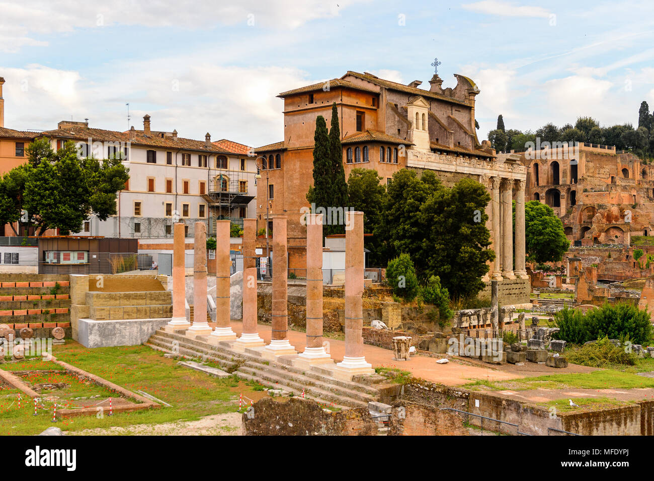 Roman Forum in the evening, a rectangular forum surrounded by the ruins ...