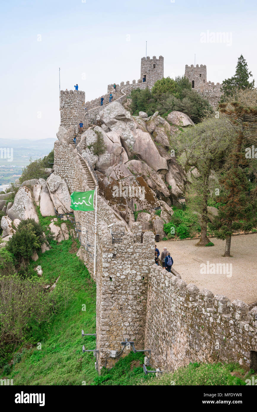 Sintra castle, view of tourists exploring the castle walls of the ...