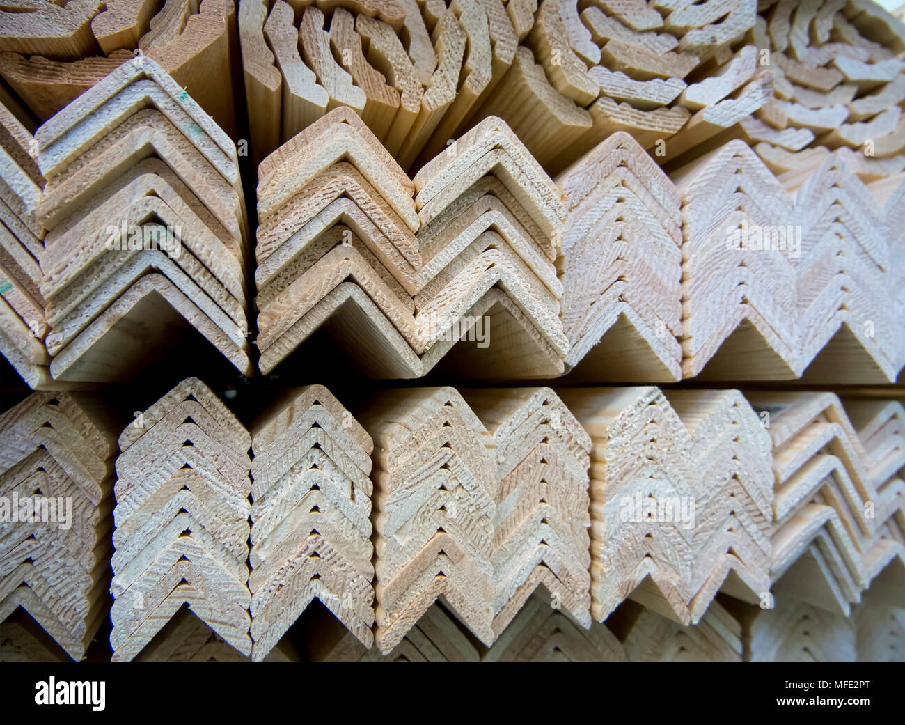 Stacking with wooden corner profile in stock Stock Photo - Alamy