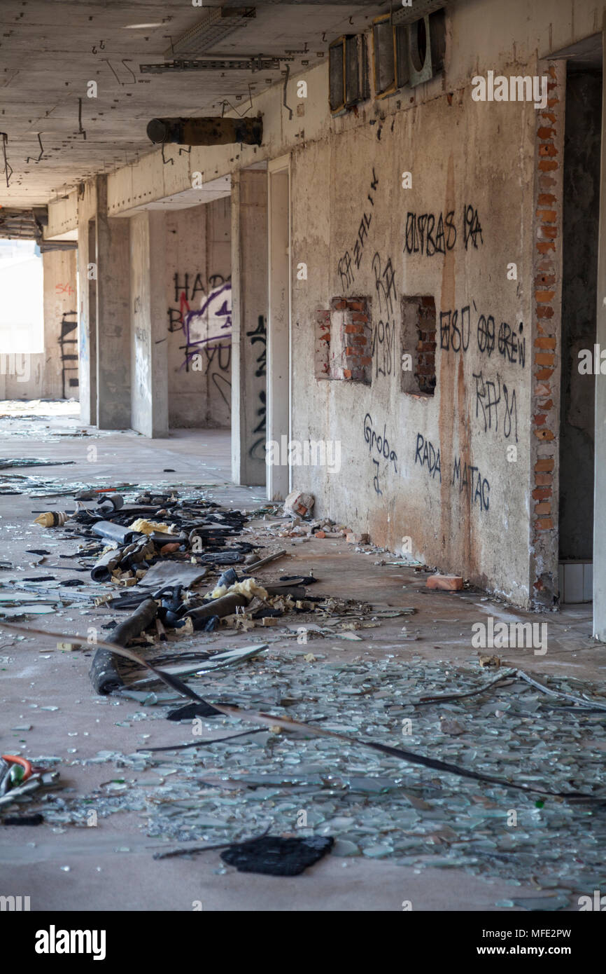 Broken glass inside a bombed out building from the Bosnian War in ...
