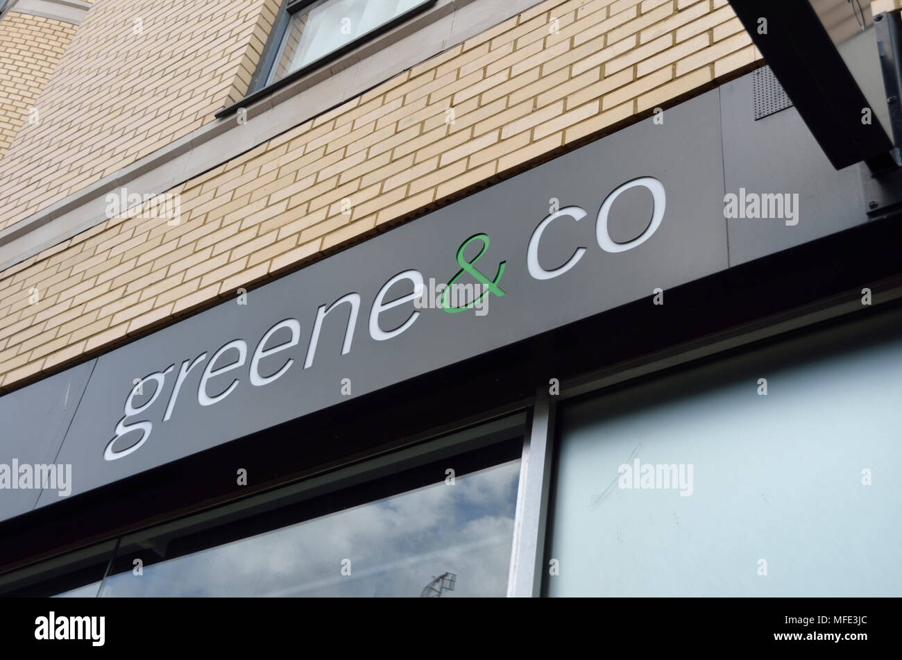 Greene and Co estate agent sign Stock Photo - Alamy