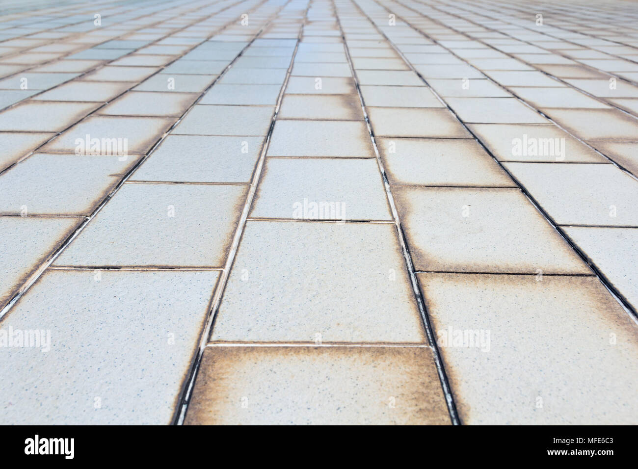Small-scale background texture of old white tile pavement Stock Photo ...