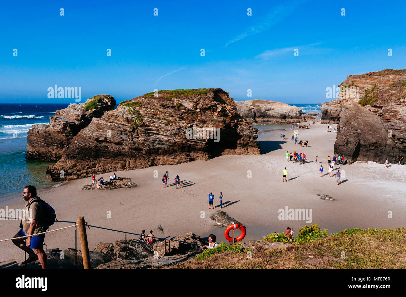 Tourists on the beach of the Cathedrals in summer. Lugo, Galicia, Spain ...