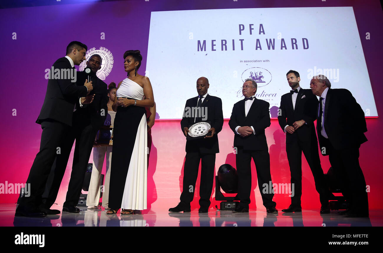 Family members collect the PFA Merit Award after it is awarded ...