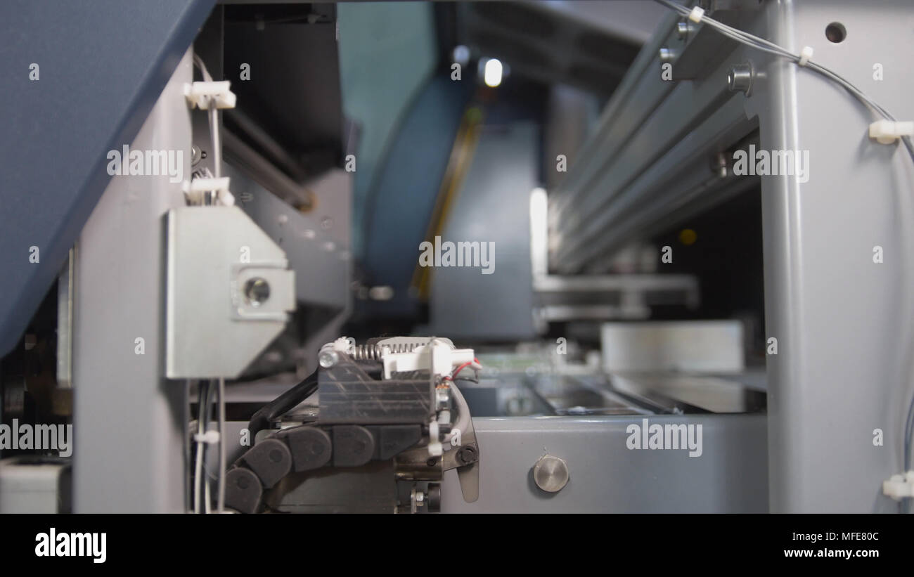 Printing press production line in the printing house Stock Photo - Alamy