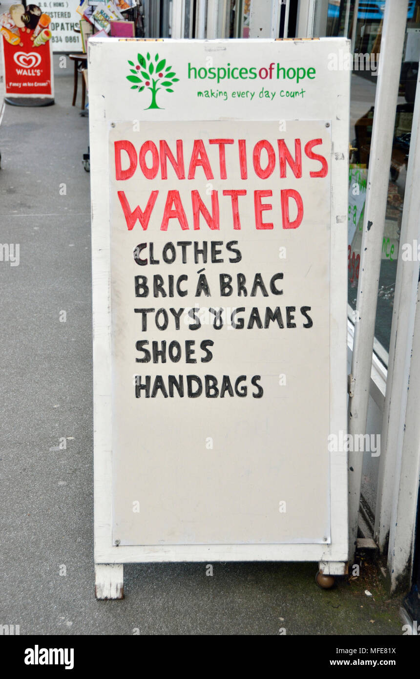 ’Donations Wanted’ sign outside a charity shop Stock Photo - Alamy