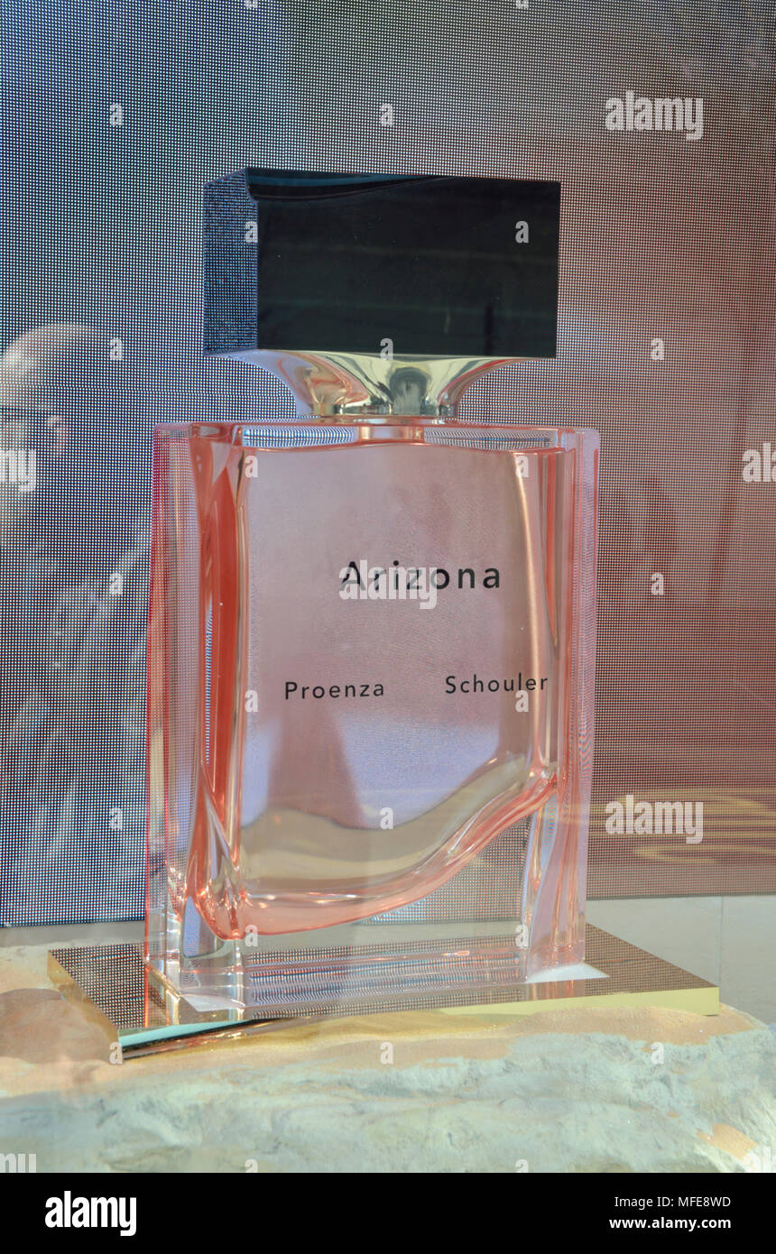Perfume bottle window display Stock Photo - Alamy