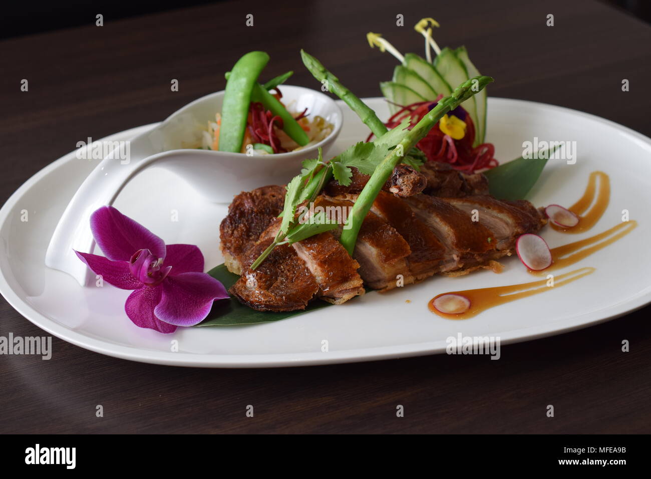 Elegant presentation of a Peking Duck dish Stock Photo - Alamy