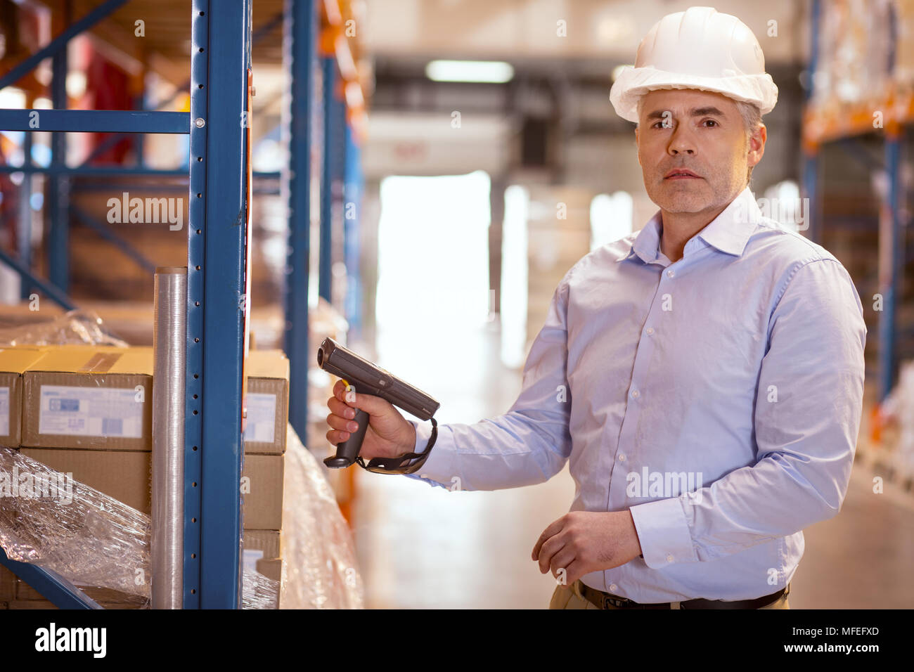 Serious professional man looking at you Stock Photo - Alamy
