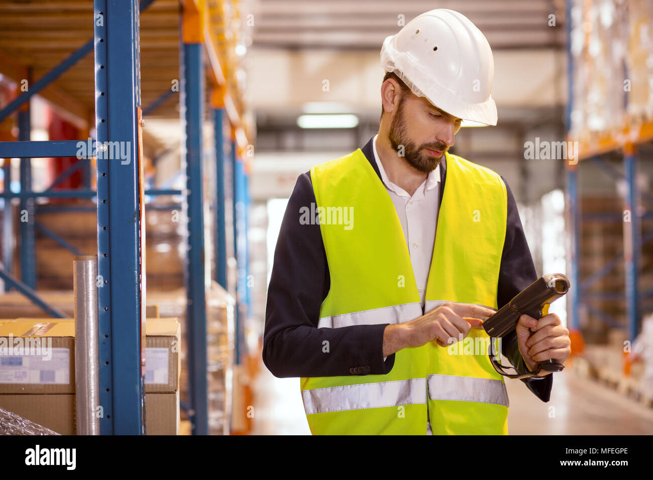 Smart handsome man touching a scanner Stock Photo - Alamy