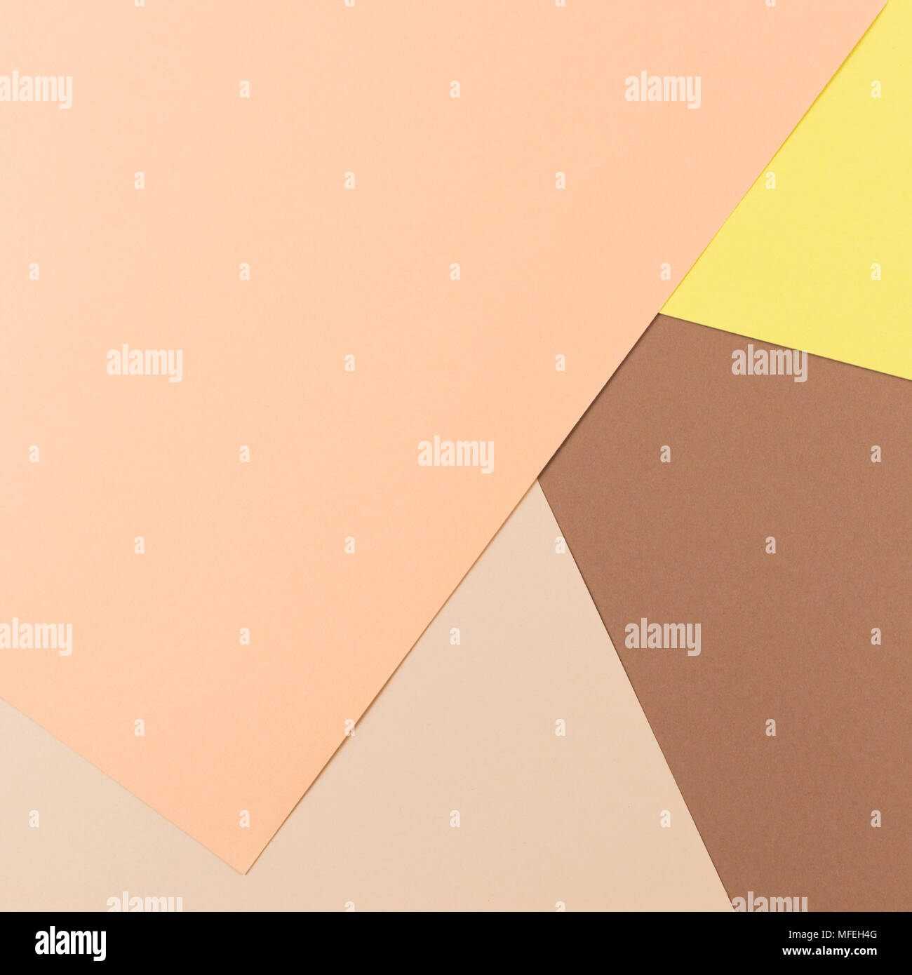 Color papers geometry composition background with yellow pink, beige ...