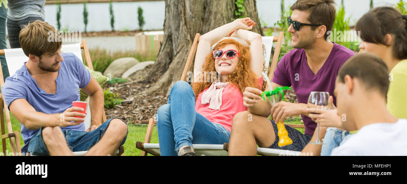 Young happy people chilling and having drinks in the countryside Stock ...