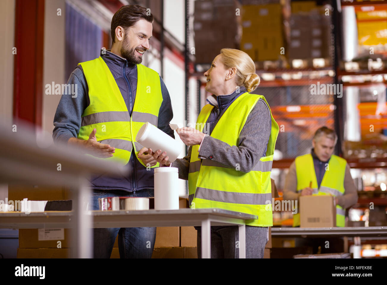 Positive nice colleagues having a conversation Stock Photo - Alamy