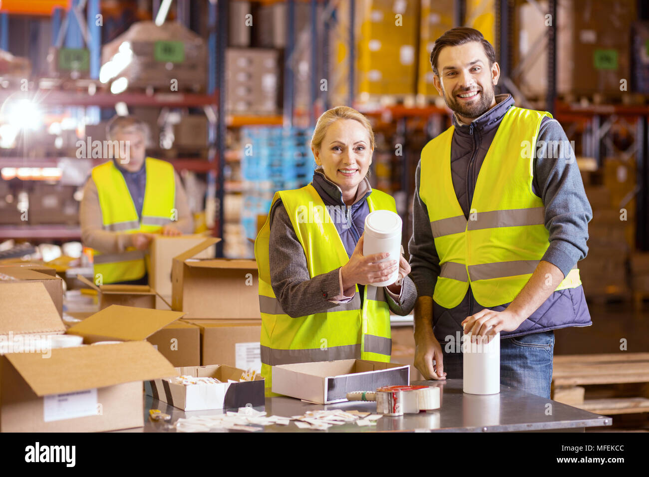 Joyful positive people looking at you Stock Photo - Alamy